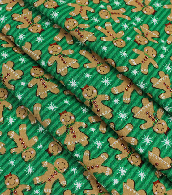 Tossed Gingerbread Cookies On Green Christmas Cotton Fabric Joann