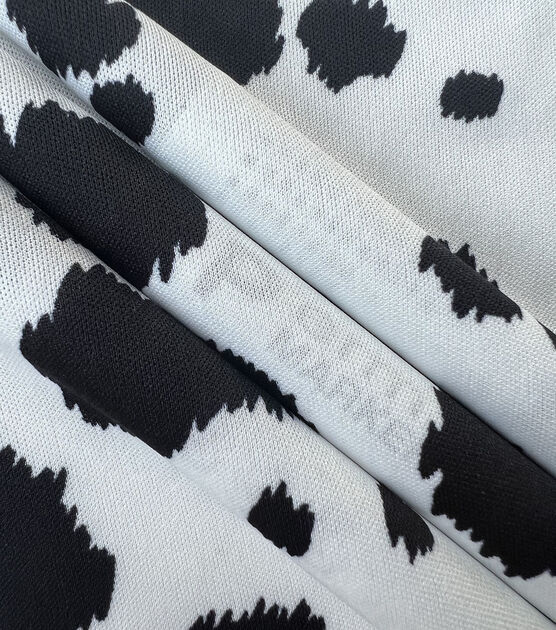 Black And White Dalmatian Print Interlock Knit Fabric By The Witching
