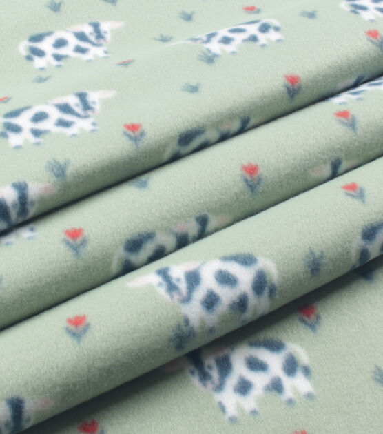 Cows Grazing On Green Blizzard Fleece Fabric Joann